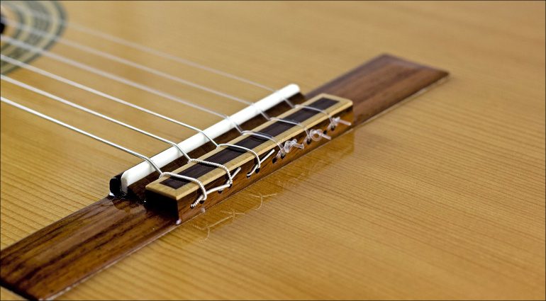 How to Change Acoustic Guitar Strings - gearnews.com